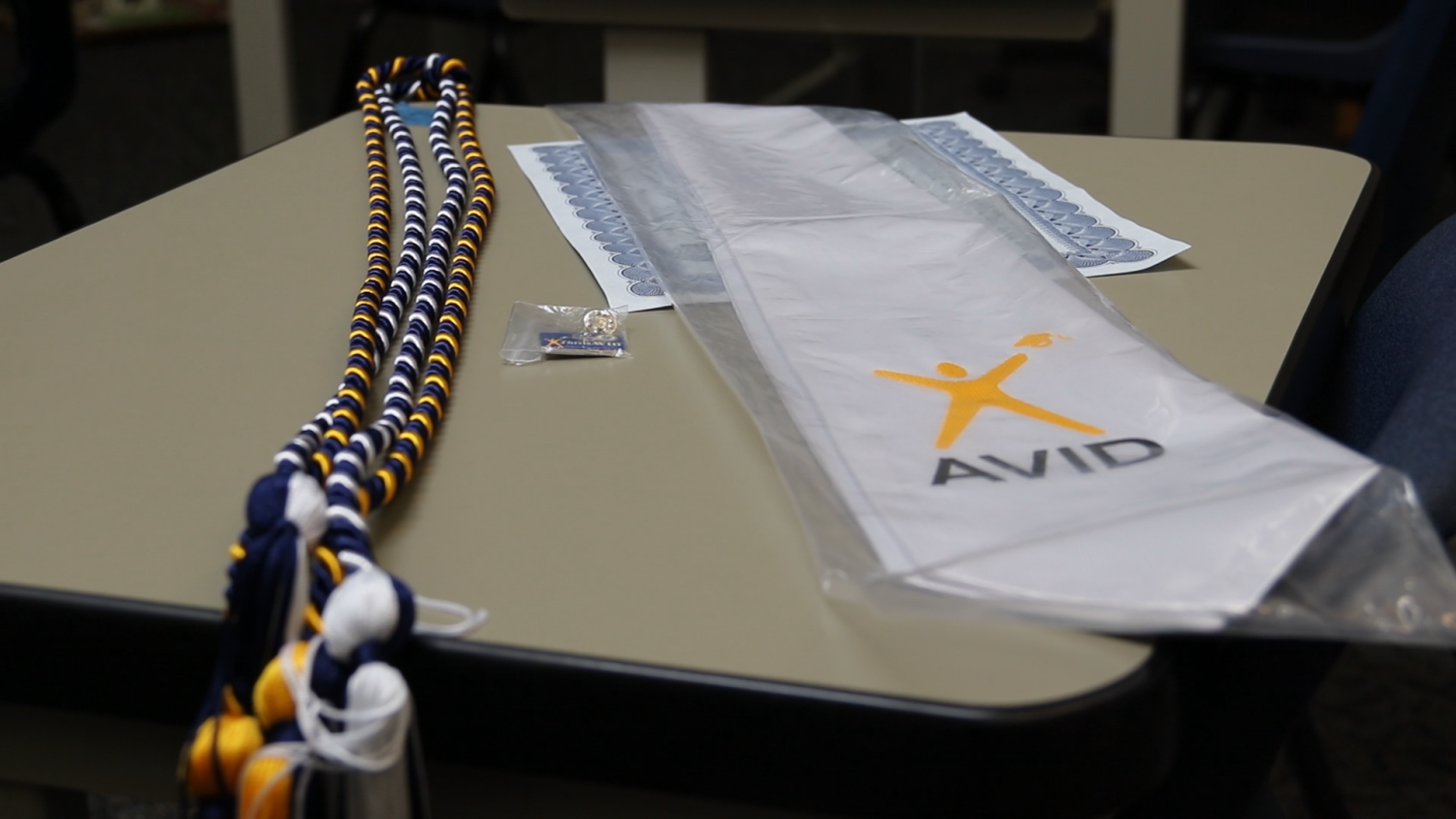 VAPA and AVID cords decorate Roseville seniors - Eye of the Tiger